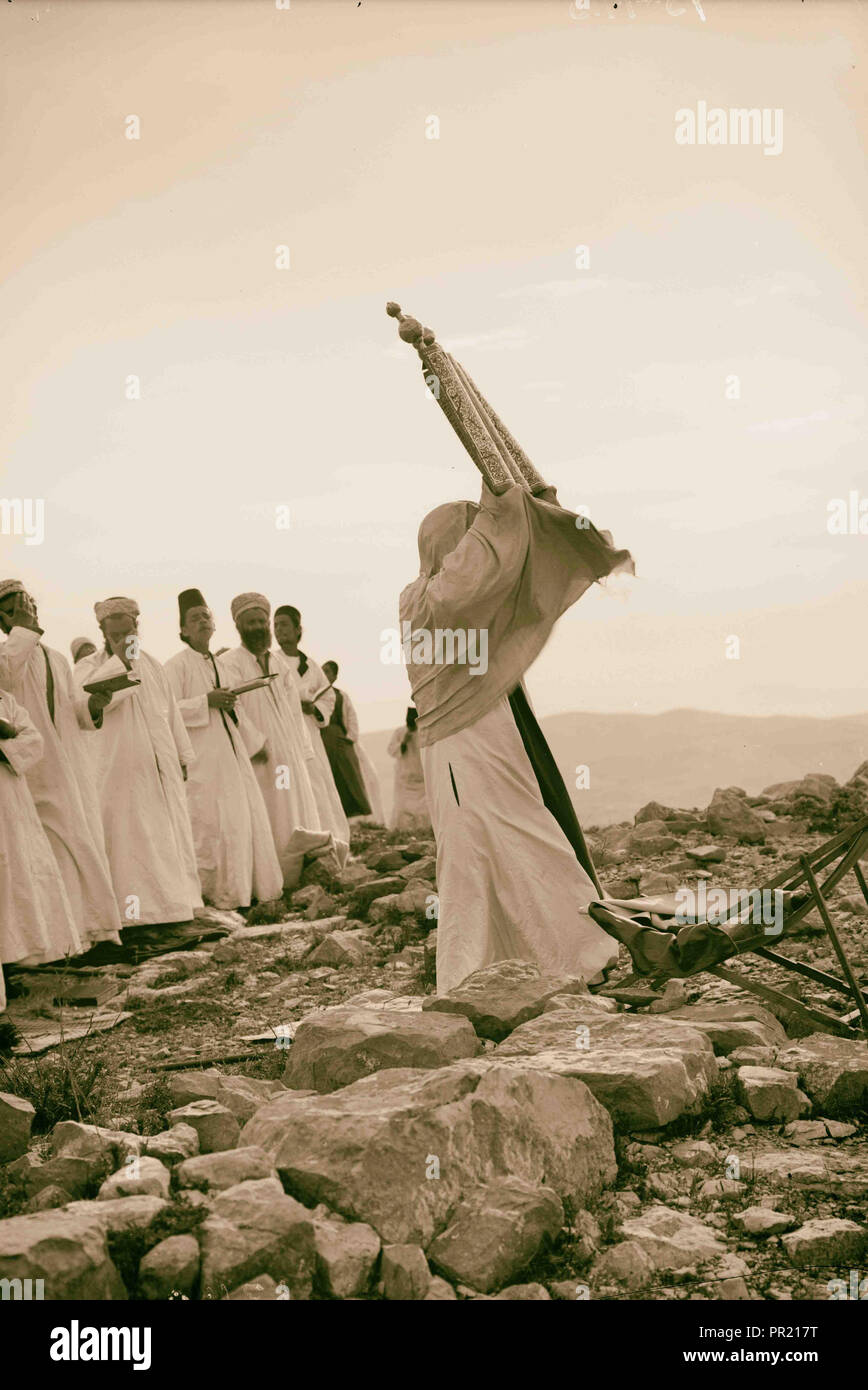 The Samaritan passover on Mt. Gerizim. High Priest exposing the scroll ...