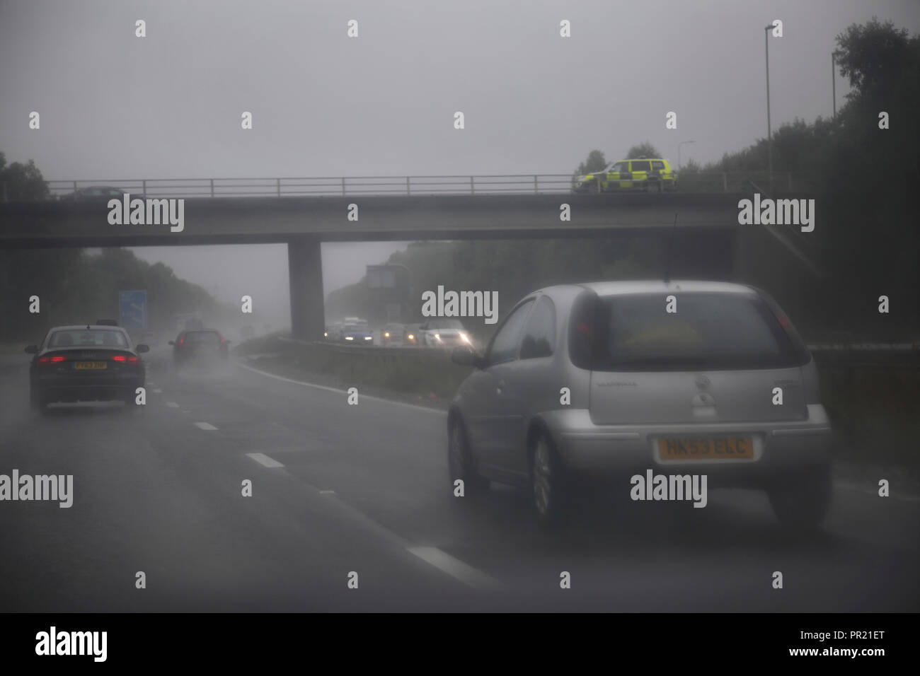Raining police hi-res stock photography and images - Alamy