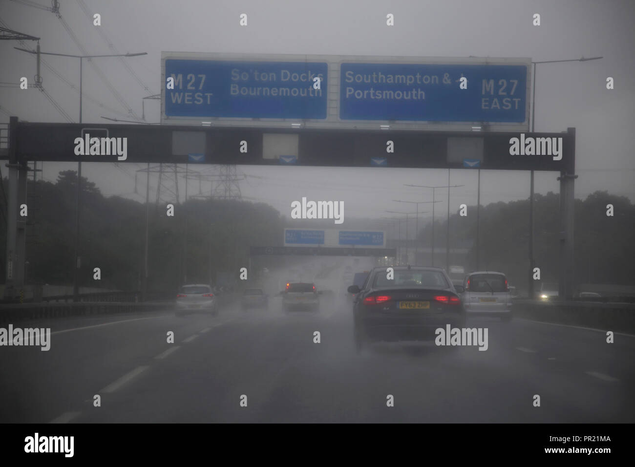 Traffic In Heavy Rain On M27 Hampshire England Stock Photo - Alamy