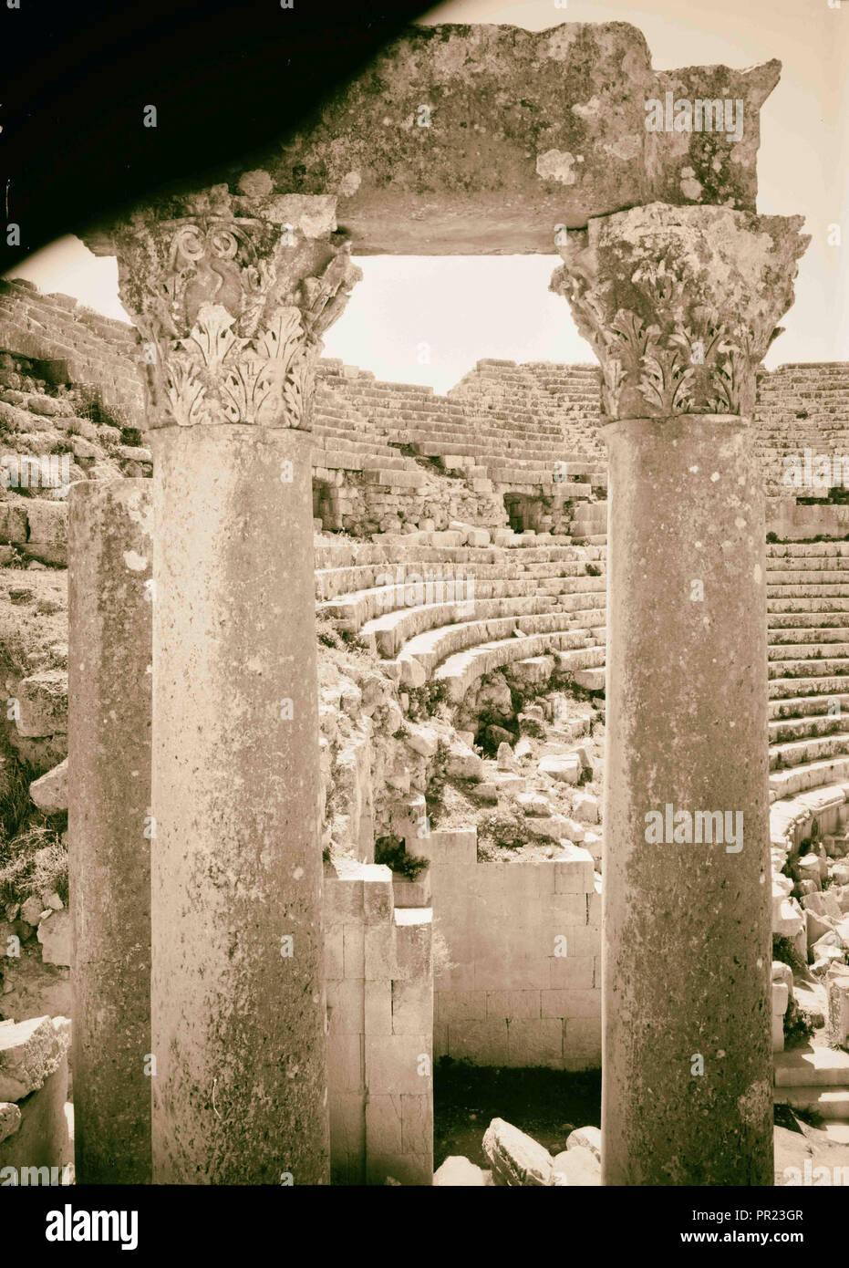Jerash. Close up of pillars & capitals of southern theatre. 1940 ...