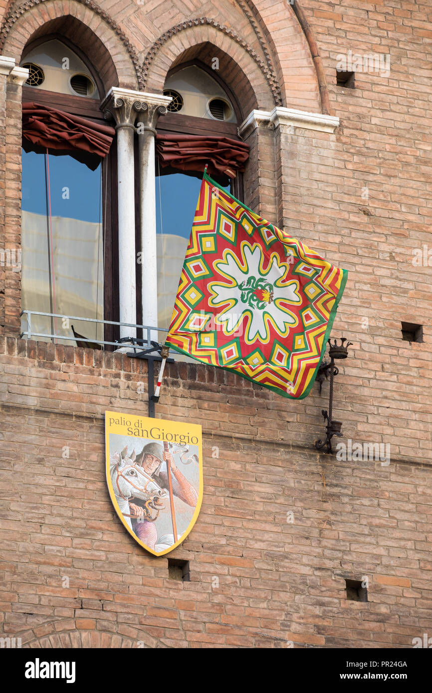 Ferrara, Italy - June 10, 2017: Palio flags and badges. The Palio of St ...