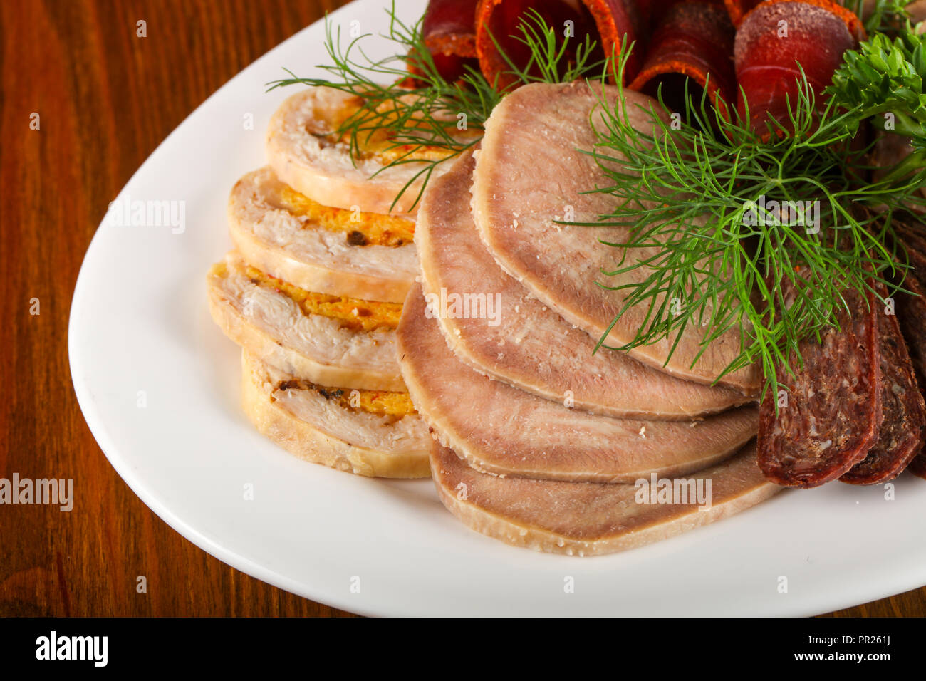 Meat plate - tongue, beef, chicken Stock Photo - Alamy