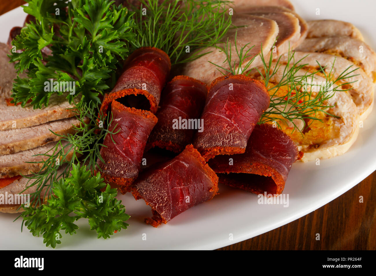 Meat plate - tongue, beef, chicken Stock Photo - Alamy