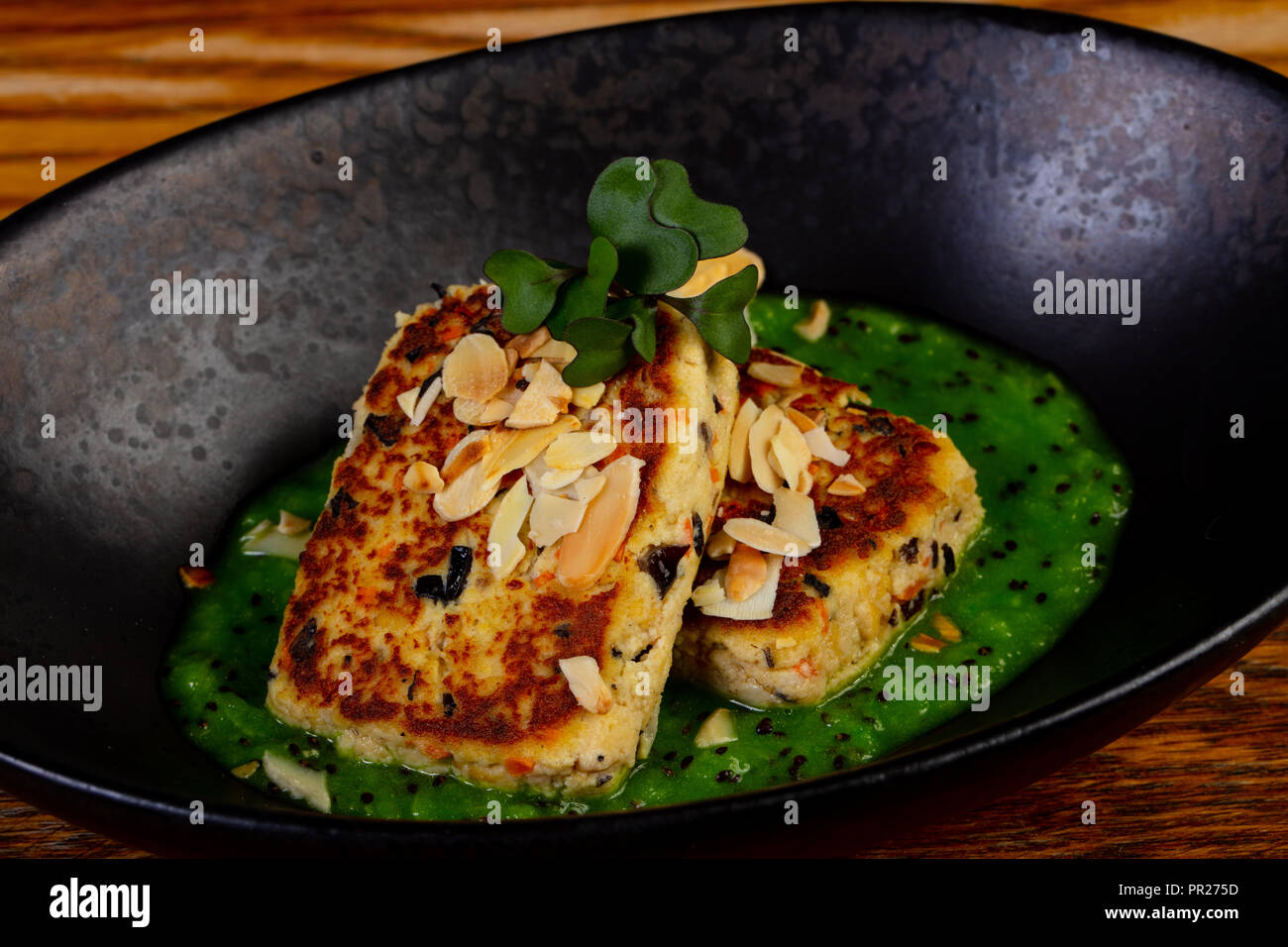 Tofu cutlet with sauce and nuts Stock Photo - Alamy
