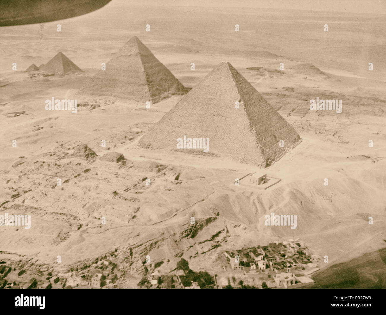 Cairo and the pyramids. Pyramids of Gizeh. Looking down on the three ...