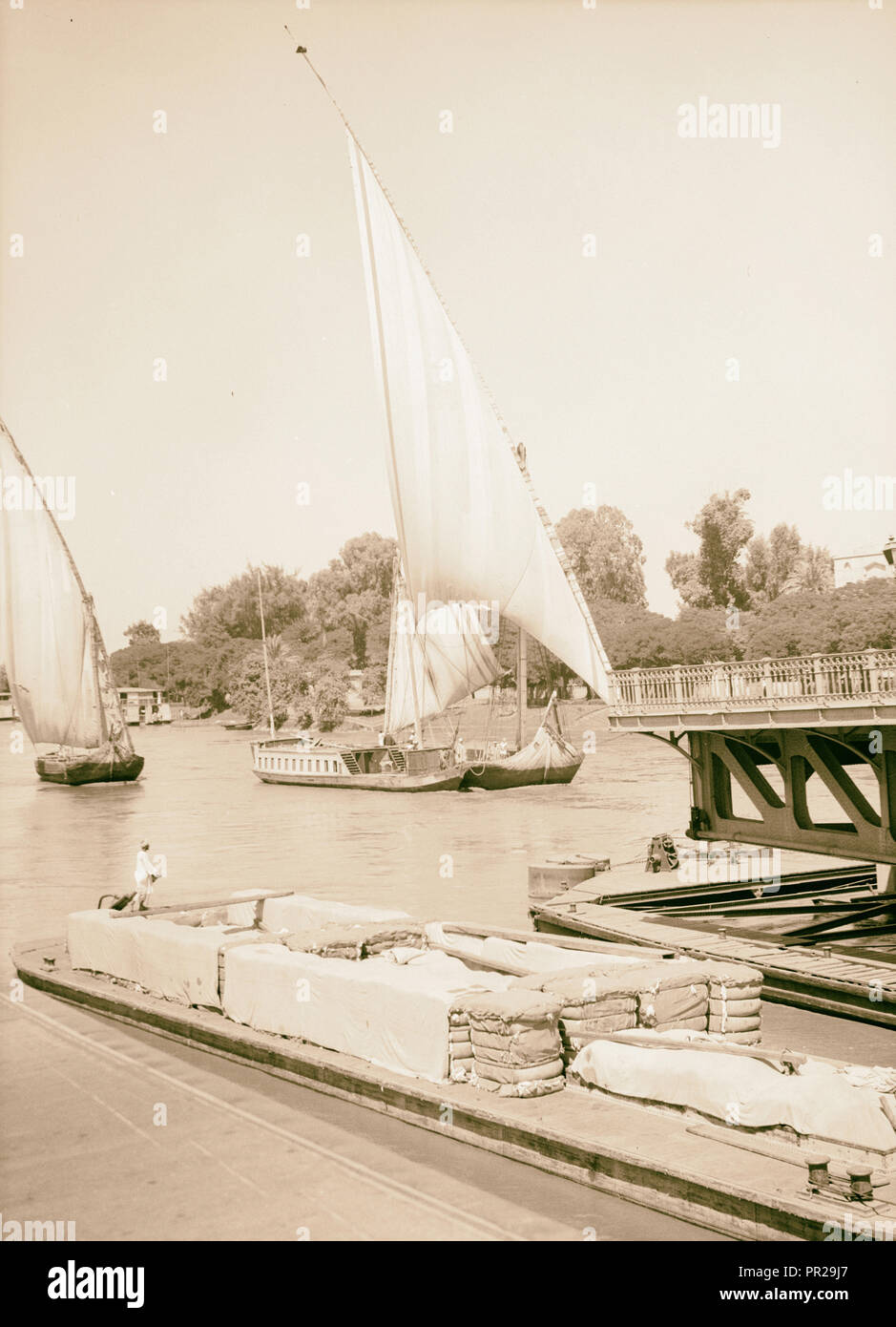 Egypt. River scenes. The Nile. Craft pasing through open bridge. 1934 ...