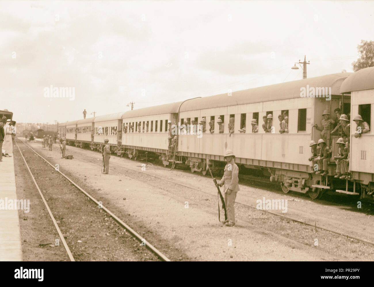 Palestine disturbances 1936. Long troops train coming into Lydda ...