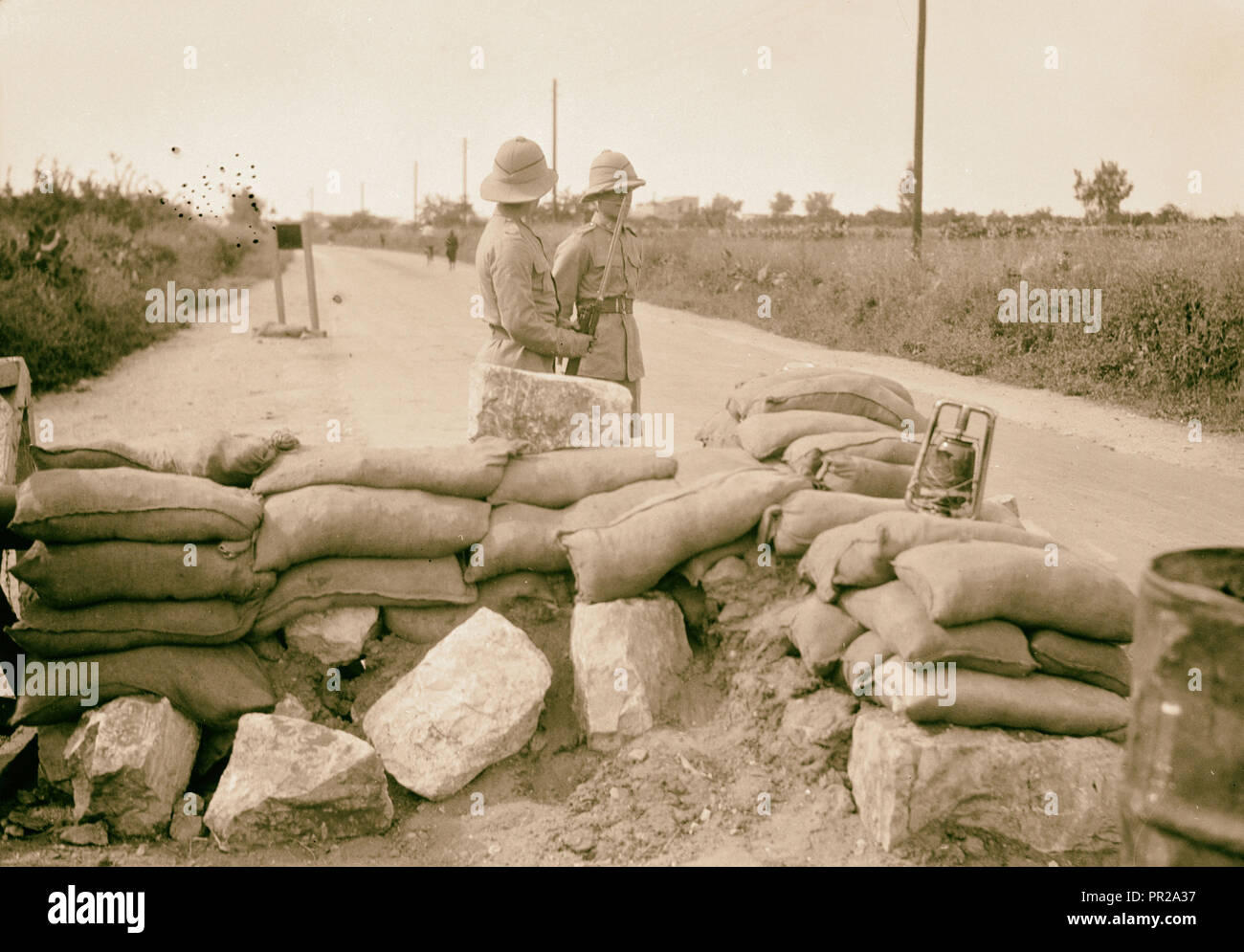 Military road block at junction Ramleh-Lydda Road, later with shade ...