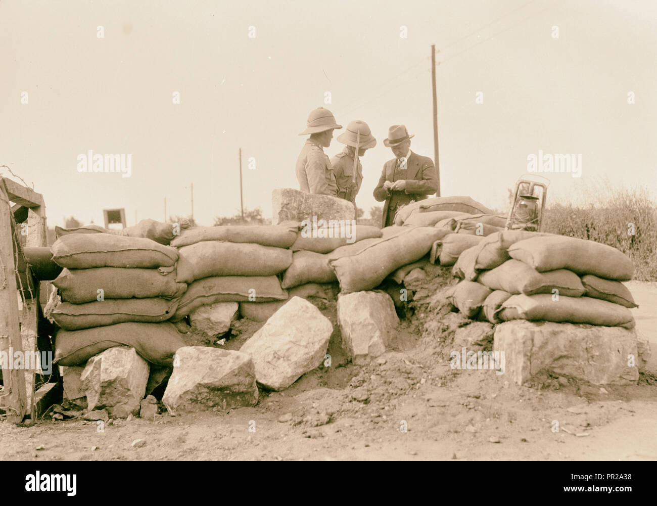 Military road block at junction Ramleh-Lydda Road, later with shade ...