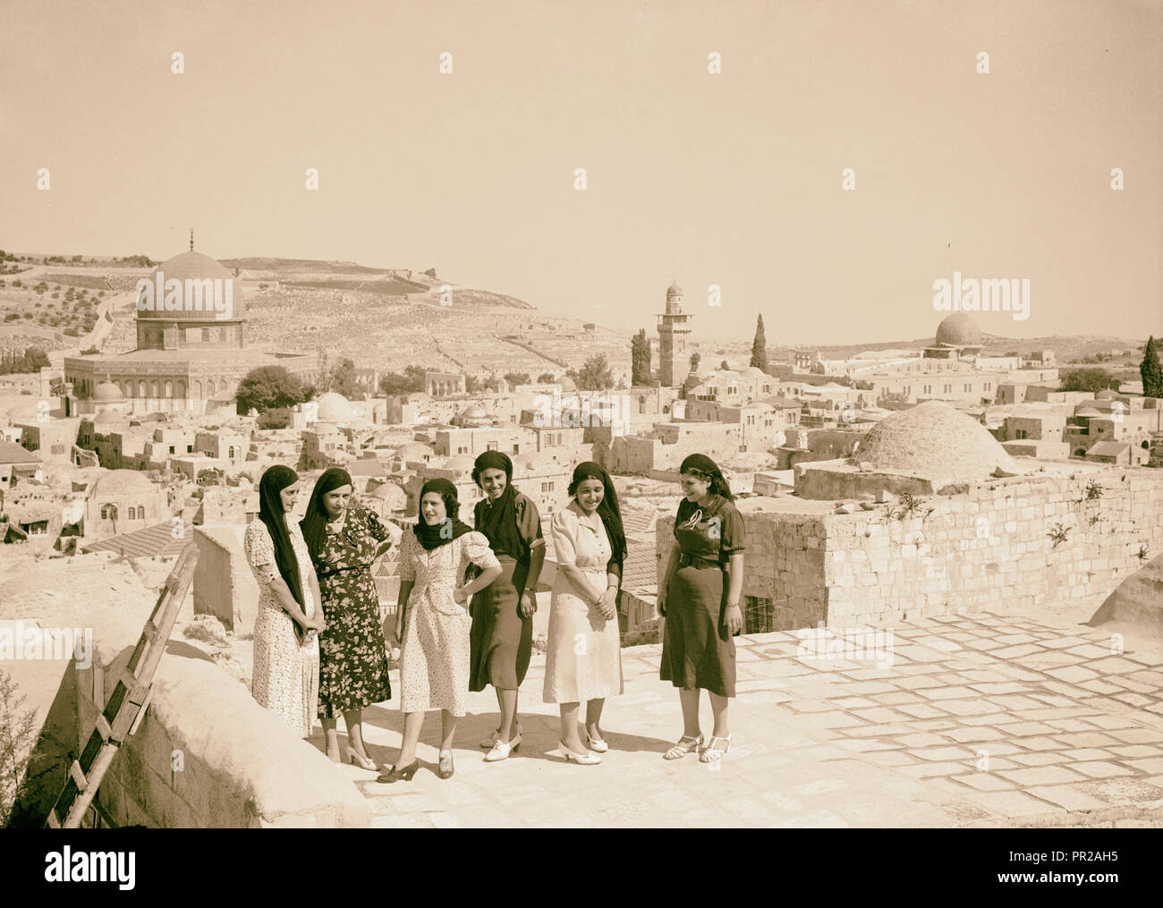 Christian Arab girls wearing head-dress symbolic of Arab nationalism ...