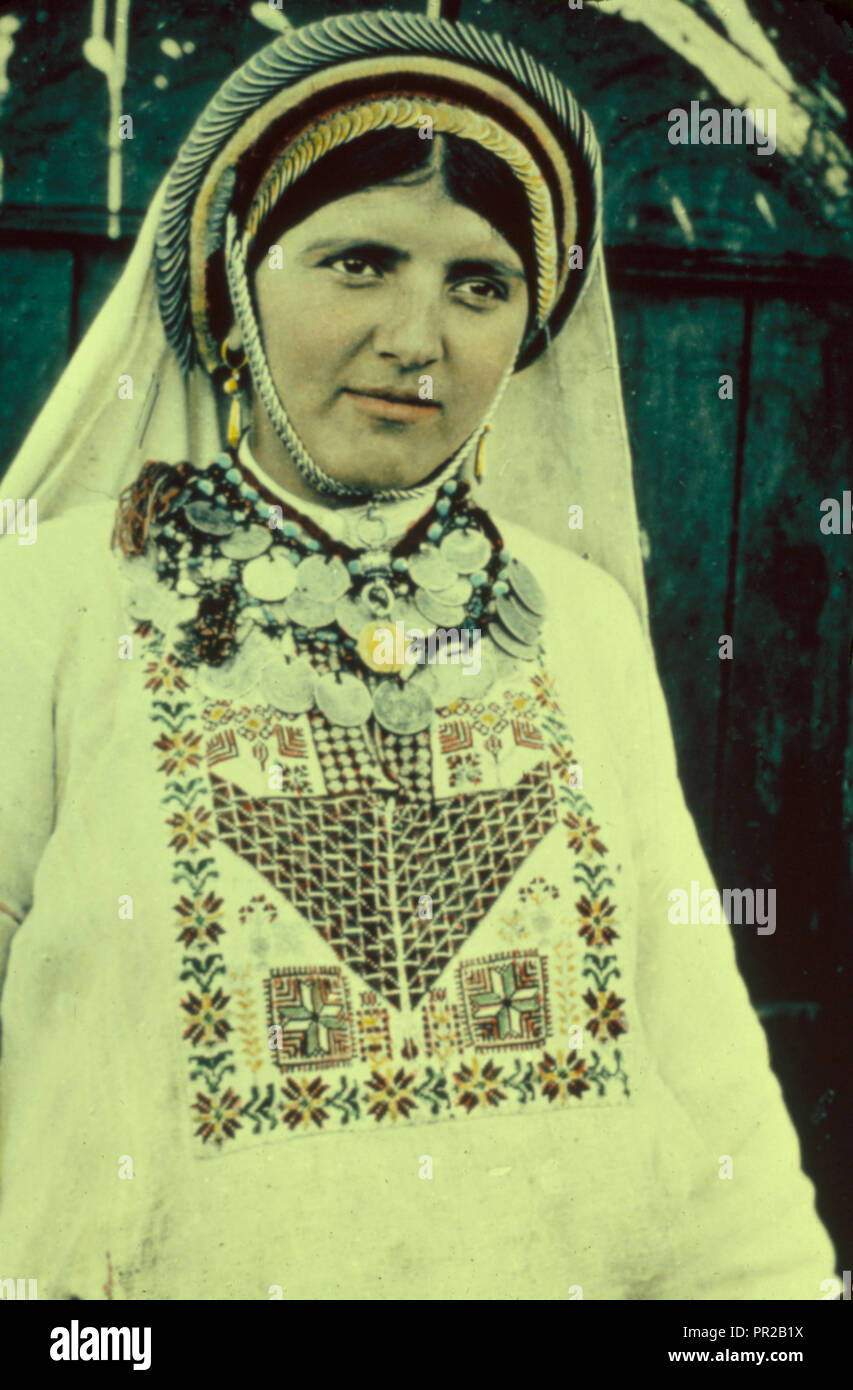 Types and character, etc. Ramallah woman in native costume. Photograph ...