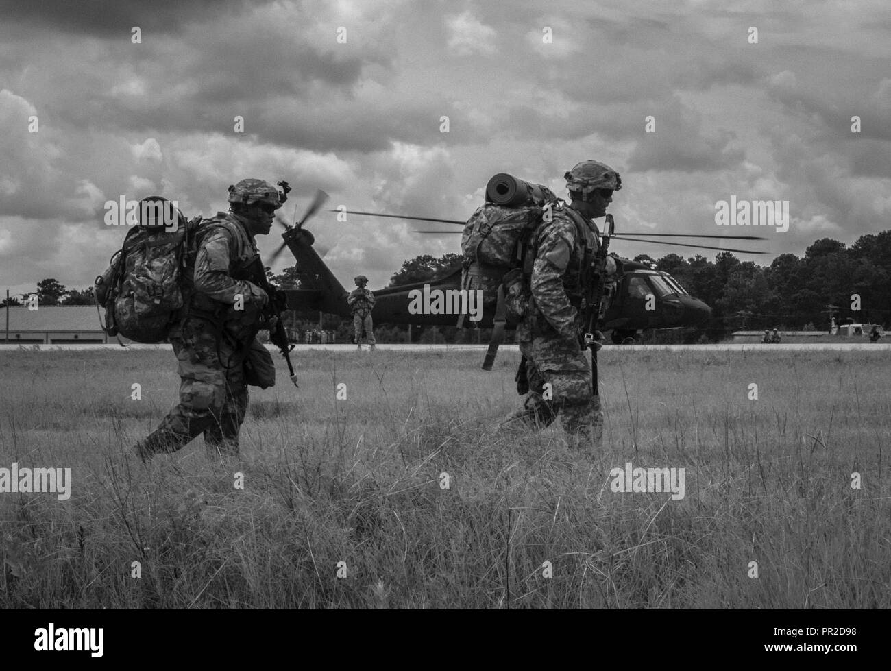Angelo Lopez, of Guayama, Puerto Rico, and Spc. Luis Santiago, from ...