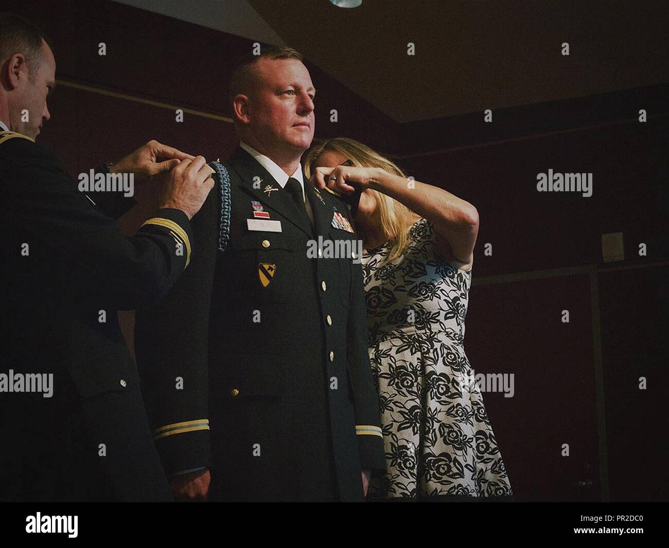 Lt. Col. Eric Riley (center), commander of the 41st Infantry Brigade ...