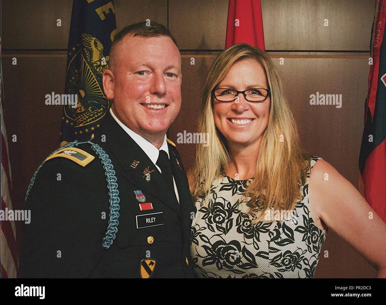 Col. Eric Riley poses with his wife, Laurie, after his promotion ...