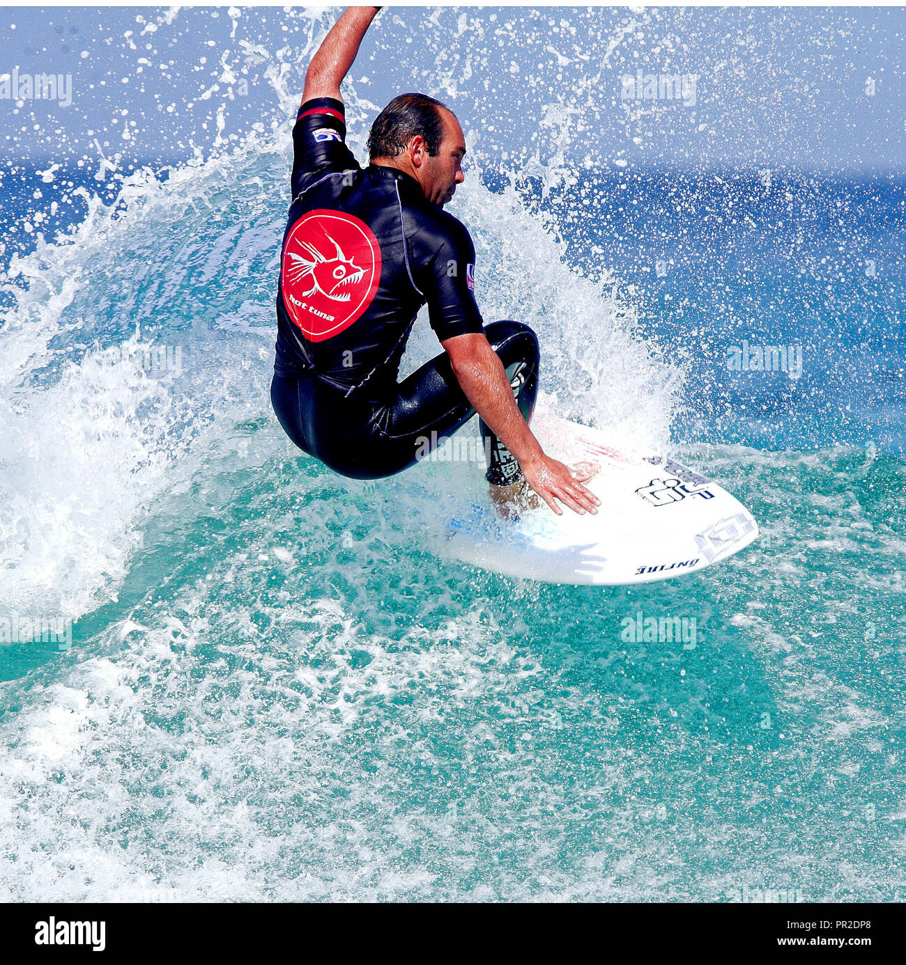 Wetsuited female surfers hi-res stock photography and images - Alamy