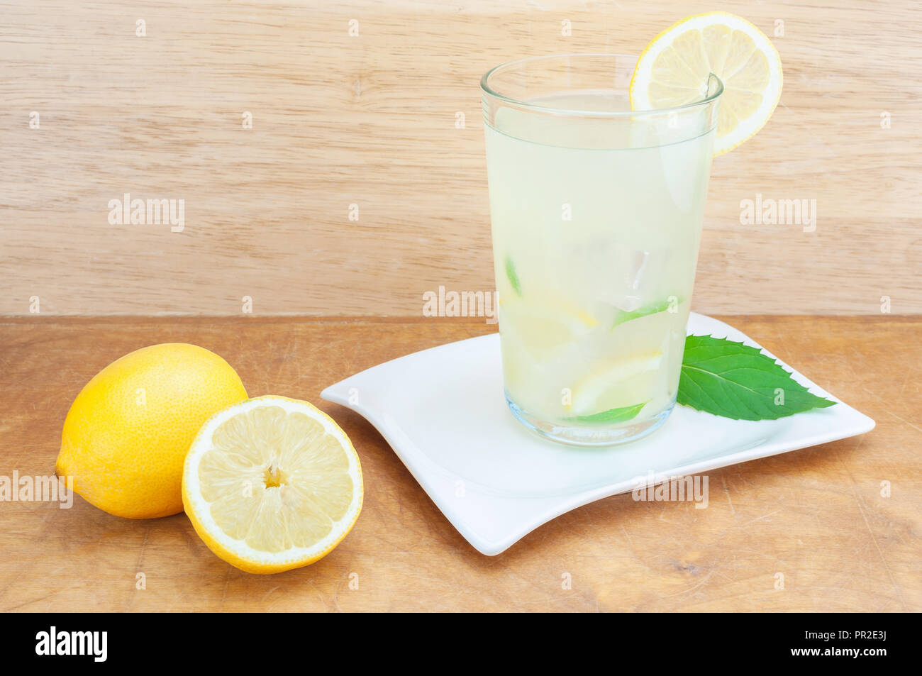 Lemon lemonade on wooden table Stock Photo - Alamy