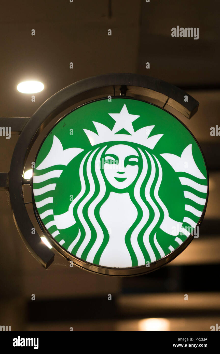 Starbucks coffee shop sign Stock Photo - Alamy