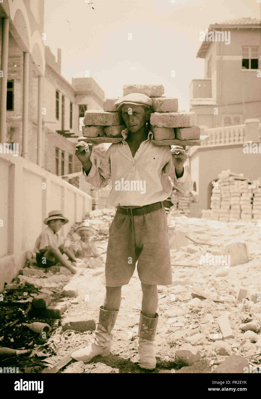 Jewish colonies and settlements. Tel Aviv. Carrying bricks. 1920 ...