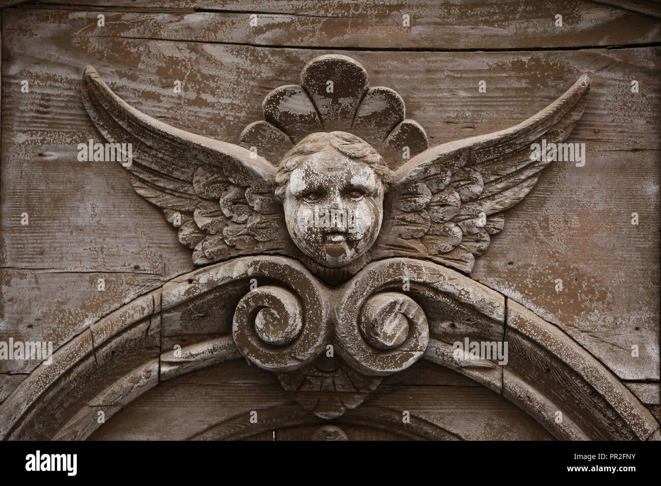 Angel depicted in the wooden relief on the door of the dwelling house ...