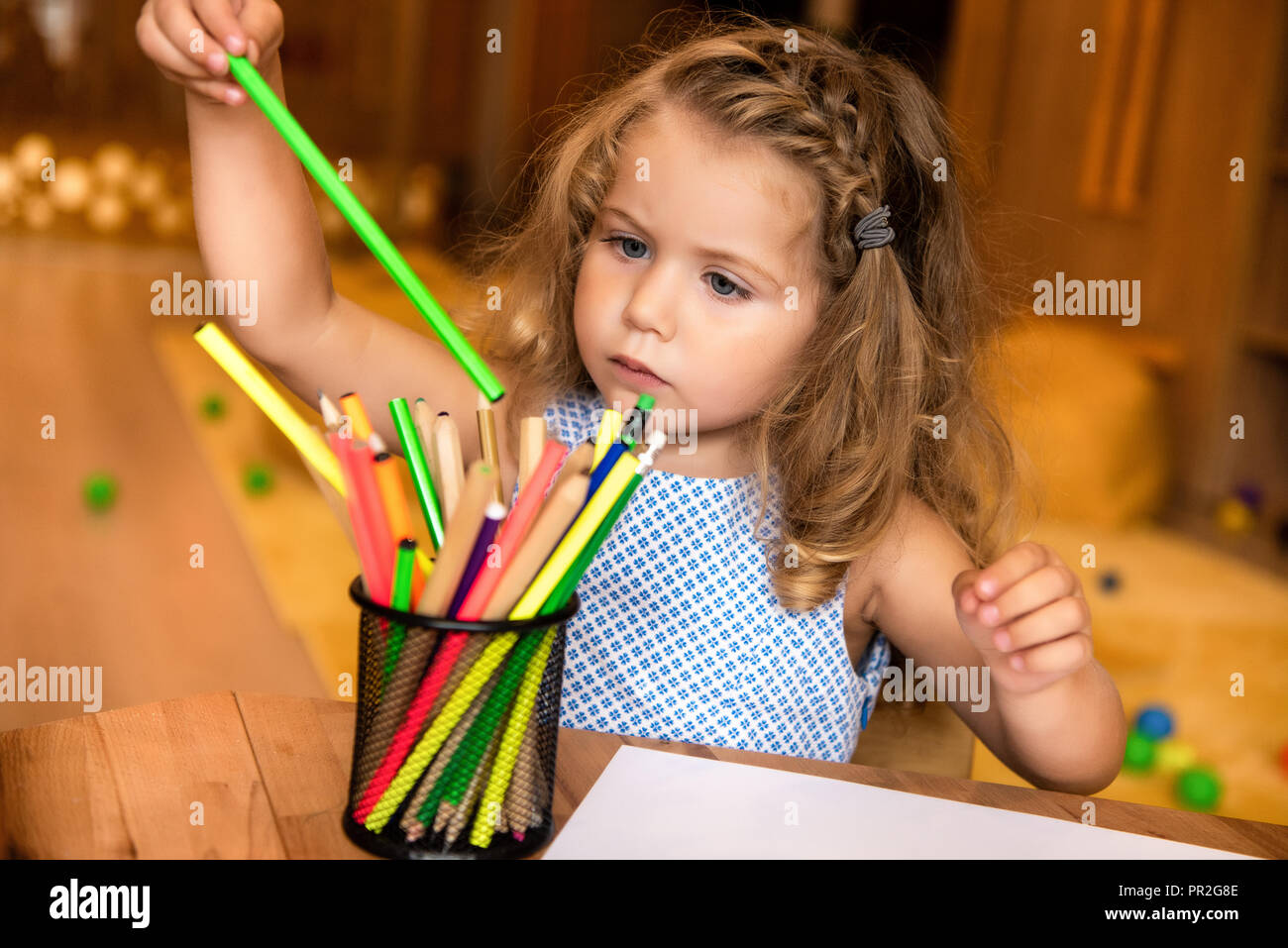 Girl pen drawing in kindergarten High Resolution Stock Photography and ...