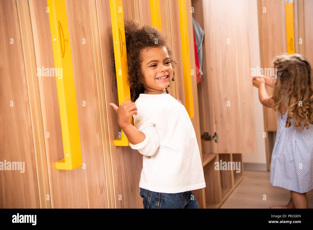 Standing by lockers hi-res stock photography and images - Alamy
