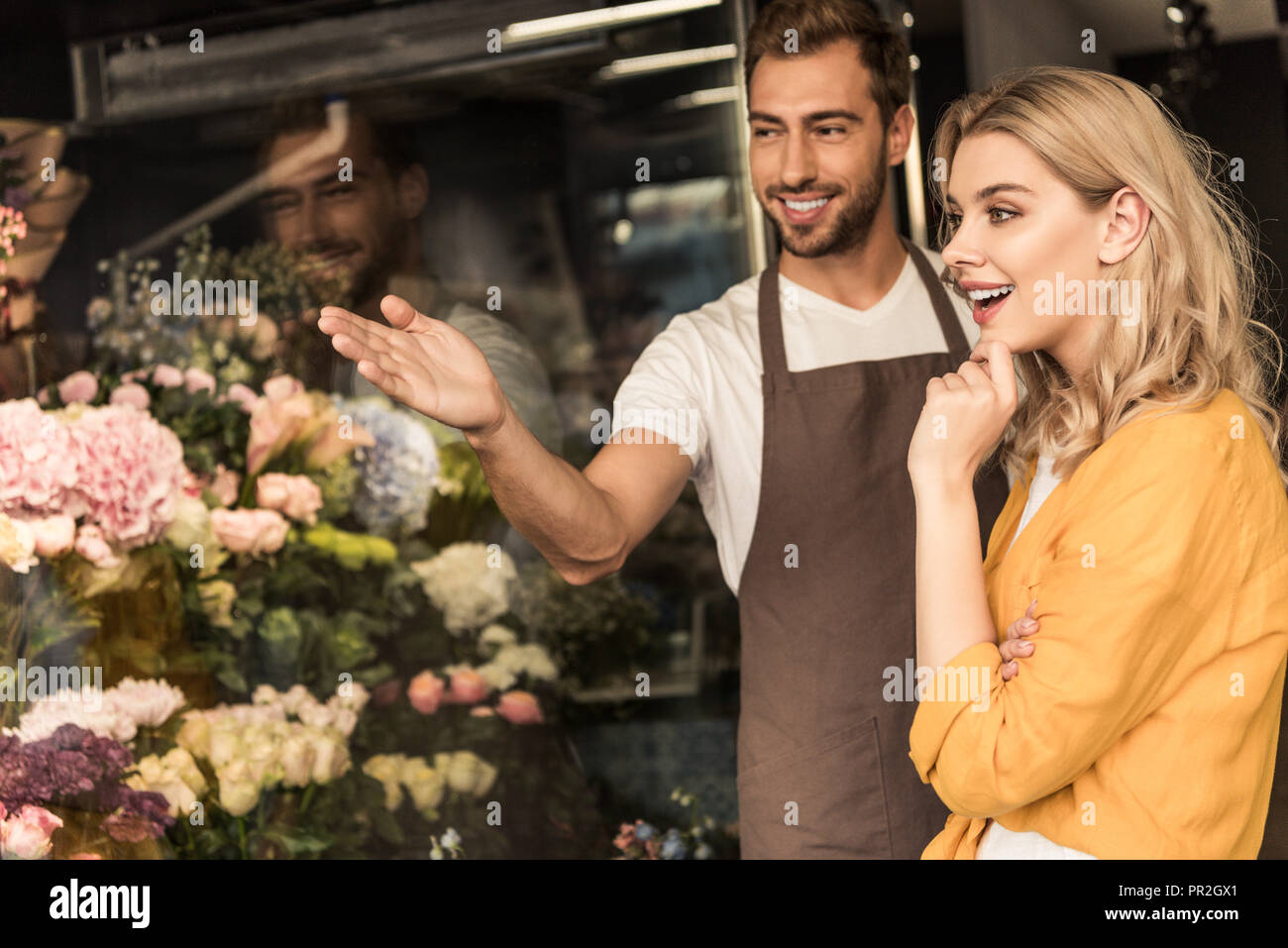 Pointing at flowers hi-res stock photography and images - Alamy