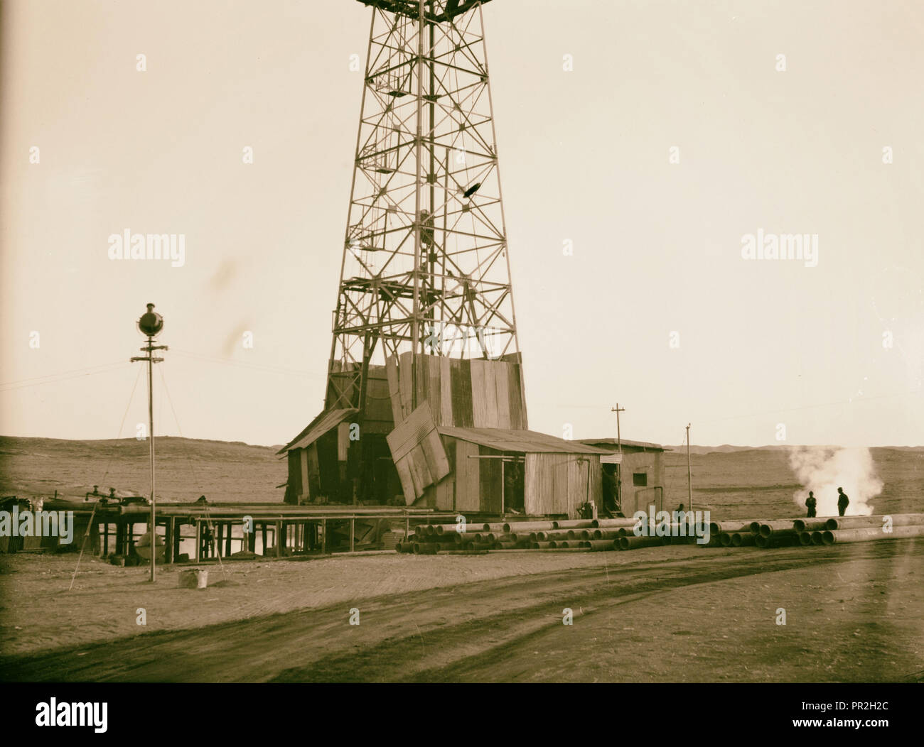 Iraq, oil fields, drilling tower. Photo possibly shows oil wells of the ...