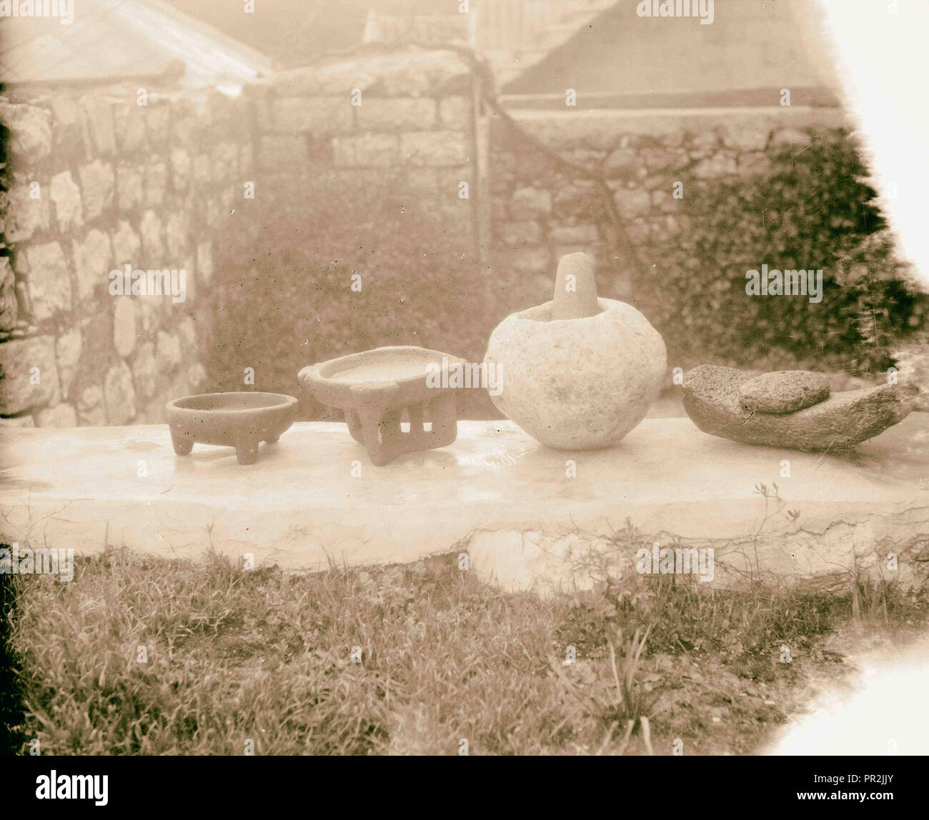 Agriculture, Primitive methods of rubbing and grinding wheat. Excavated ...