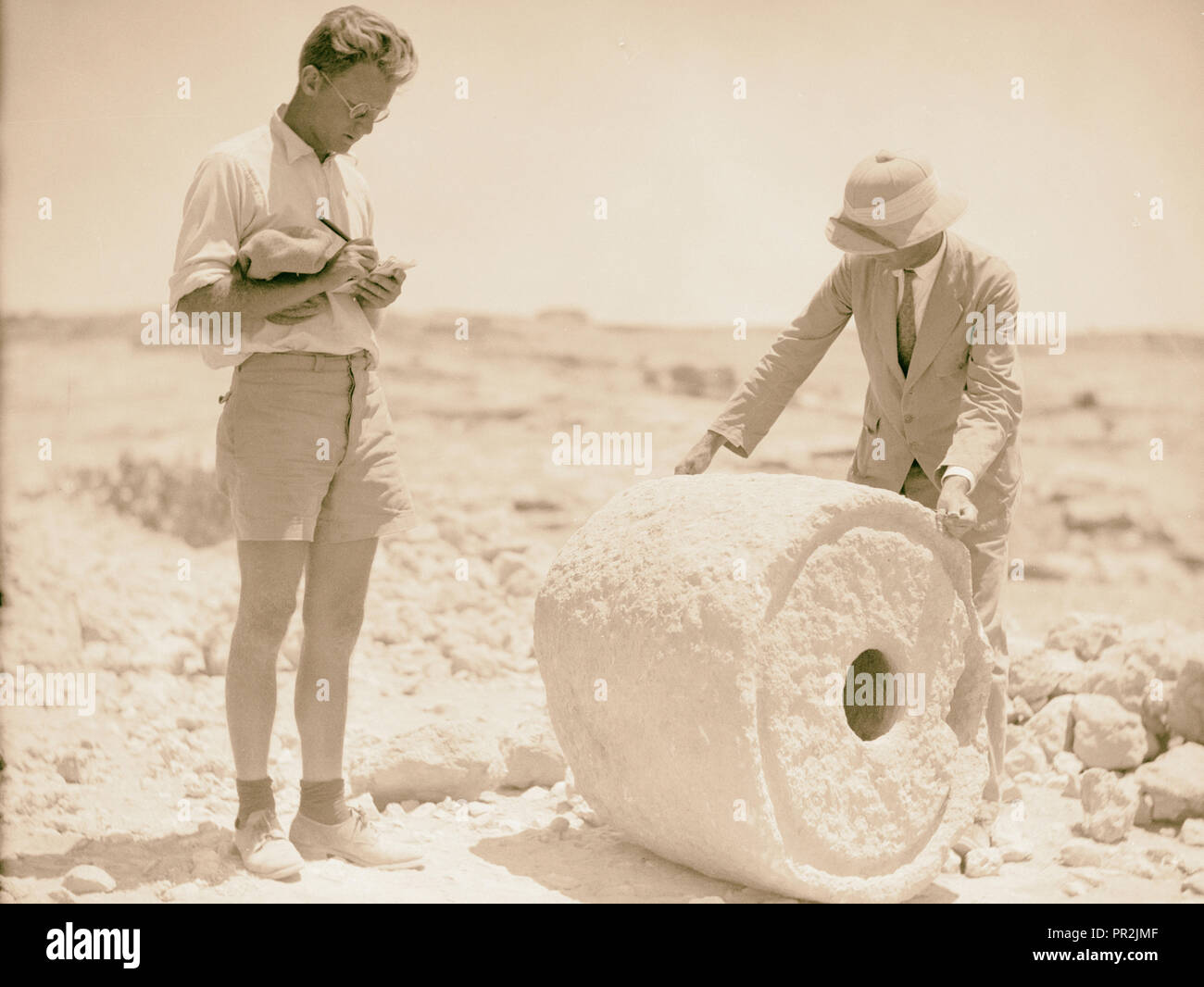 Excavations. Tell Beit Mirsim, (Kirjath Sepher). Excavators measuring ...