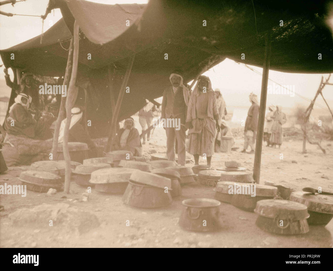 Pan-Islamic conference gathers at Shunet Nimrin, Transjordan. Pots of ...