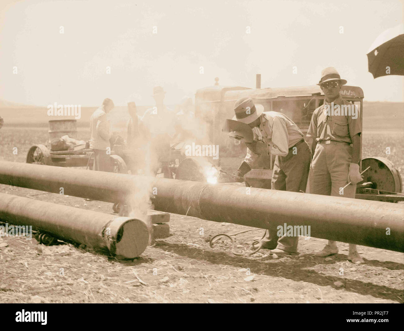 Laying of the Iraq Petroleum Company's pipe line across the Plain of ...