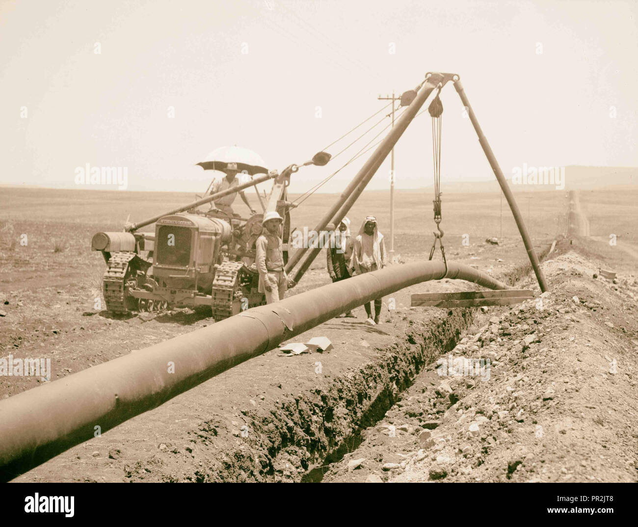 Laying of the Iraq Petroleum Company's pipe line across the Plain of ...