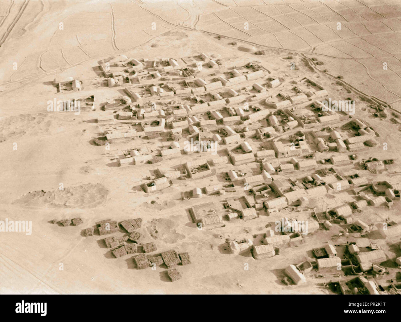 Air route to Baghdad via Amman and the desert. Iraq typical mud village ...