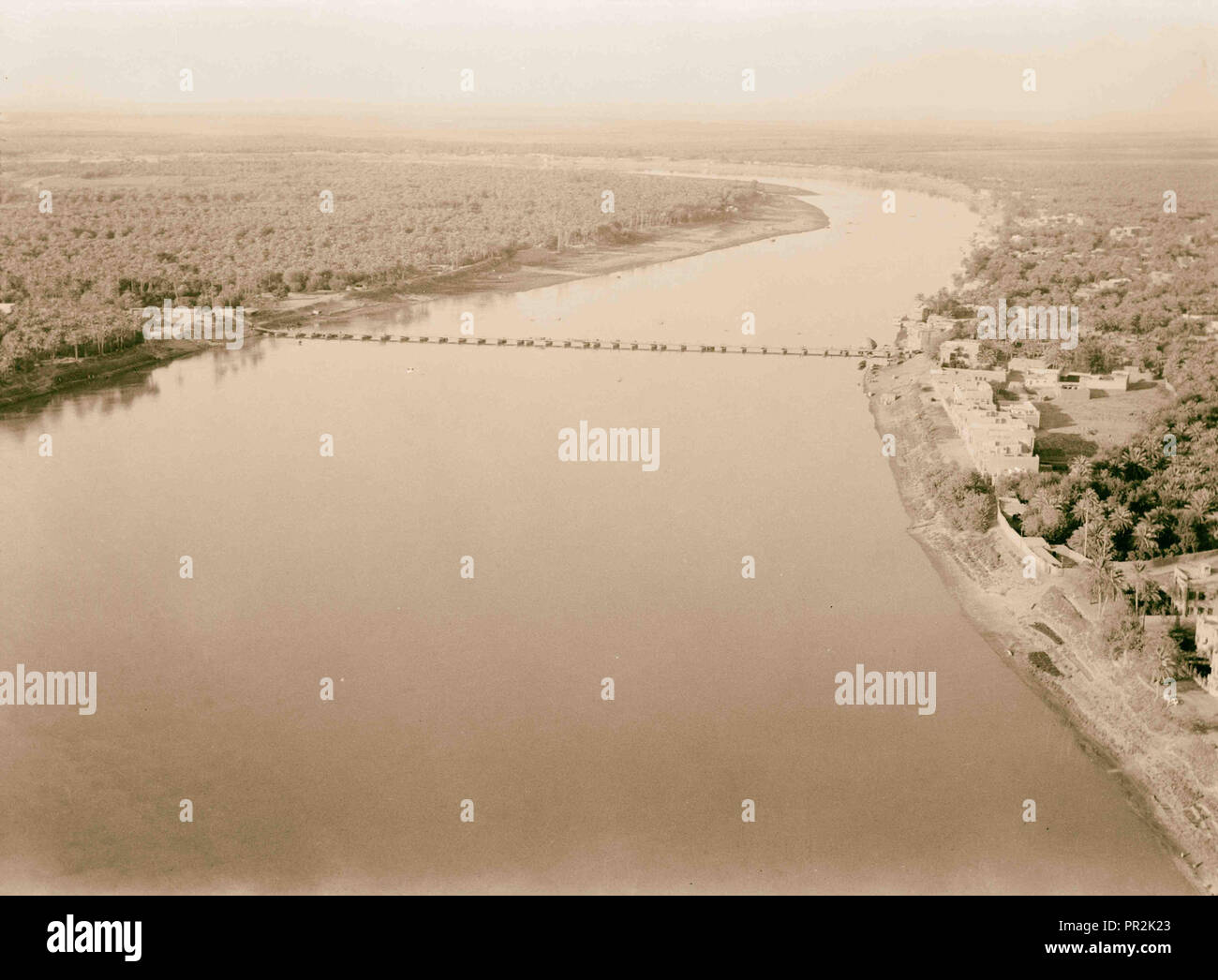 Air route to Baghdad via Amman and the desert. Tigris River. Pontoon ...