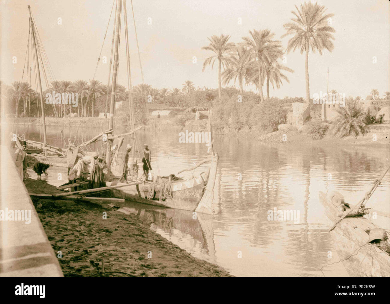 Iraq. River scenes on the Euphrates taken at Hilla. Typical river boats ...