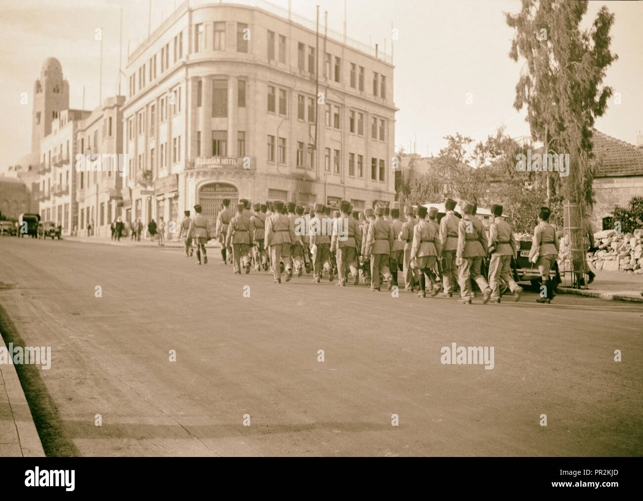 Jewish Supernumerary Police, line of about 50 men marching on Julian ...
