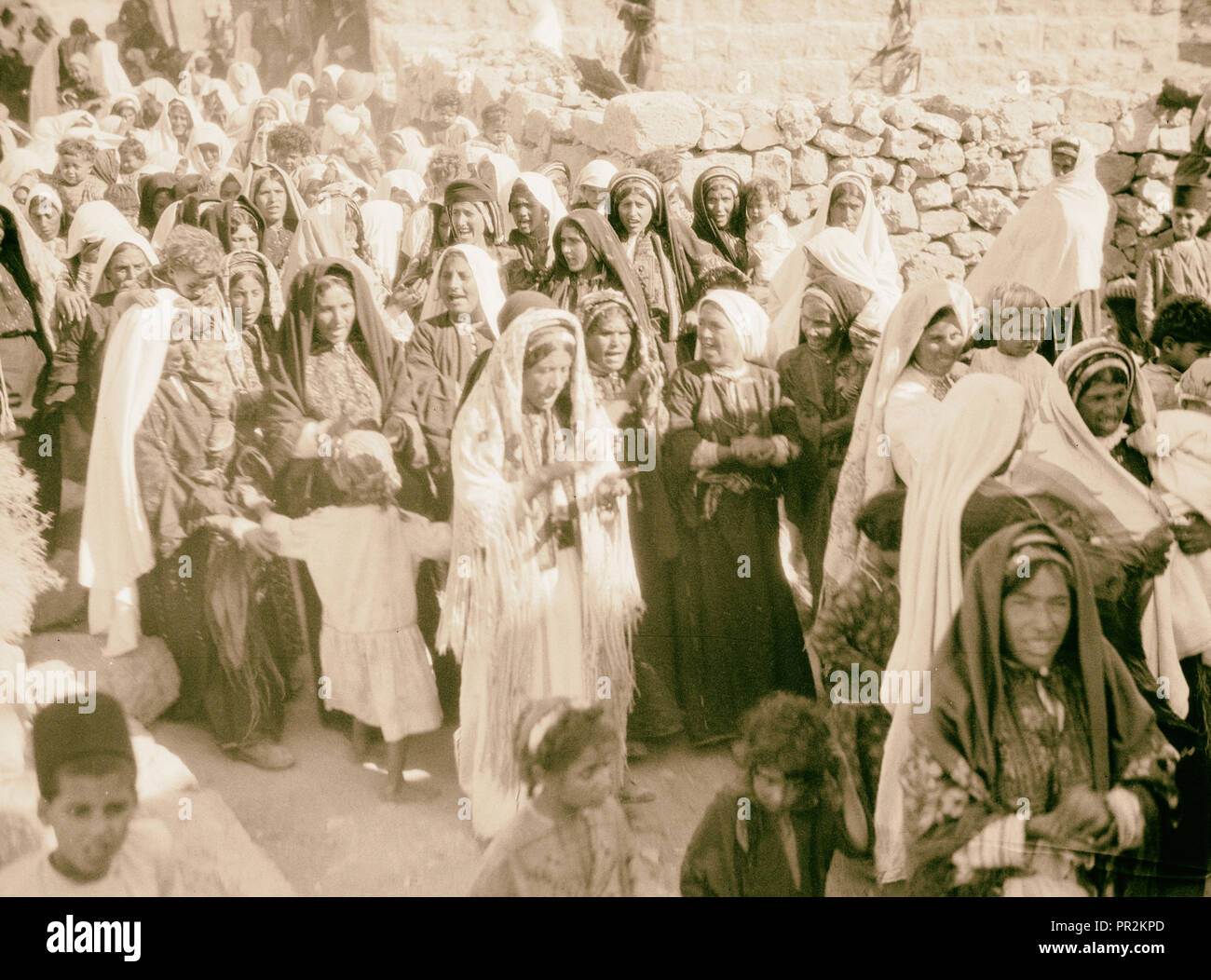 Wedding procession at Betunia, group of peasant women. 1934, West Bank ...