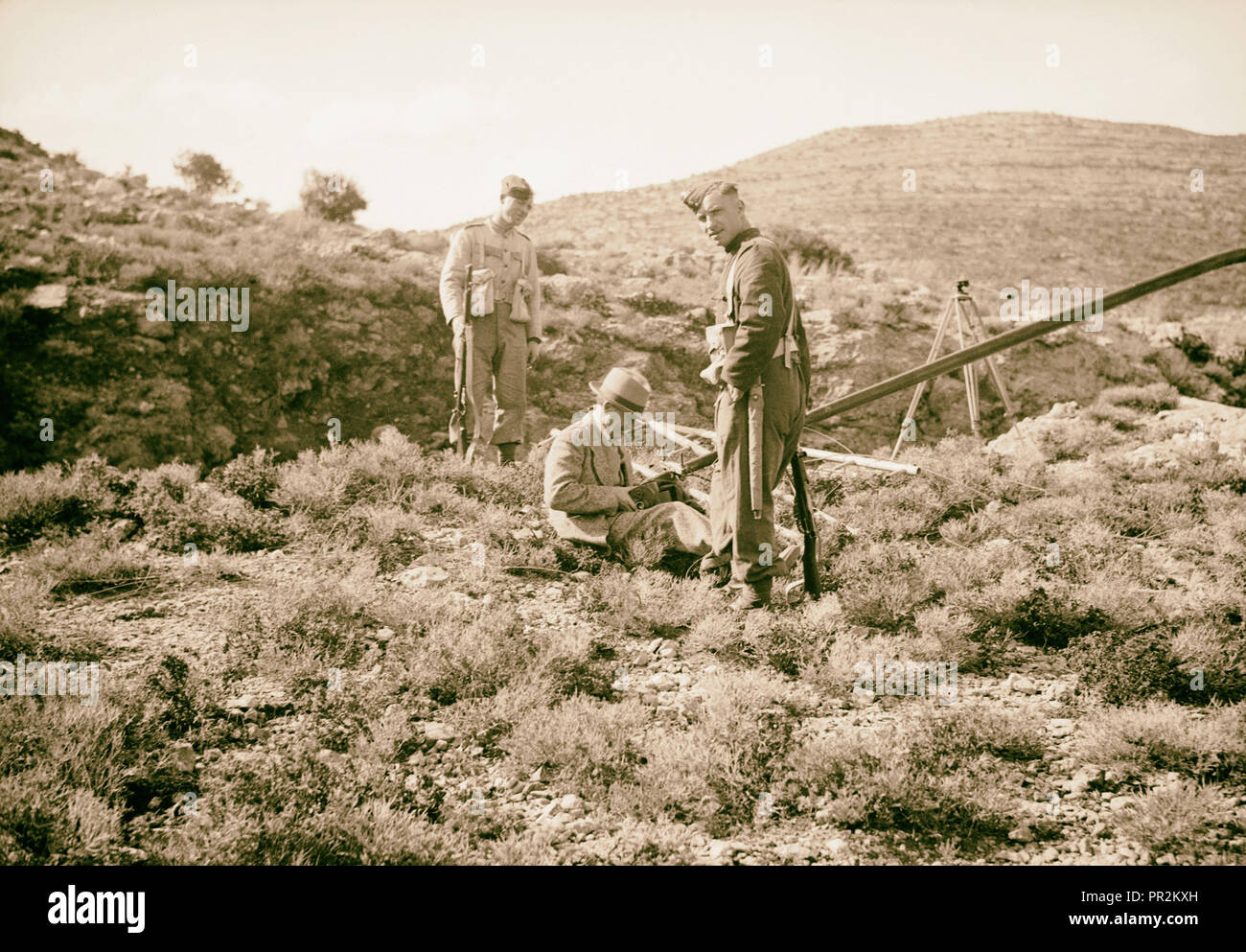G. Eric Matson fixing Eymo, near the wreck [near Deir esh-Sheikh ...