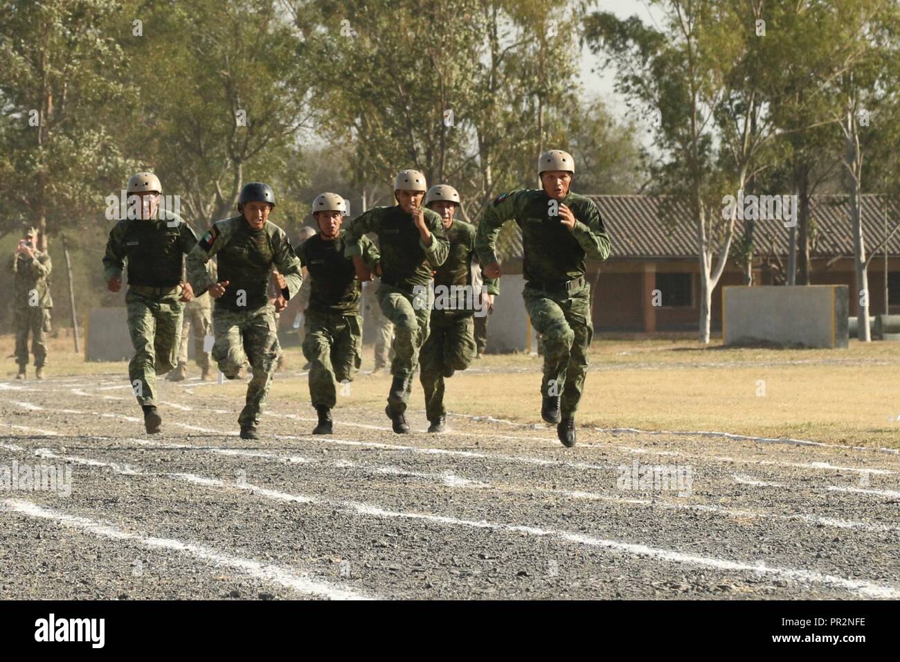 Team Mexico races toward the finish line of the Fuerzas Comando ...