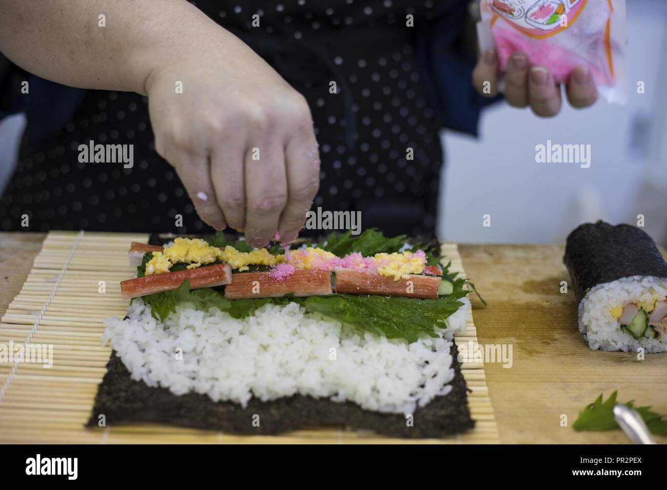 Sachiko Tamura, a chef with the Iwakuni City Food Promotion Association ...