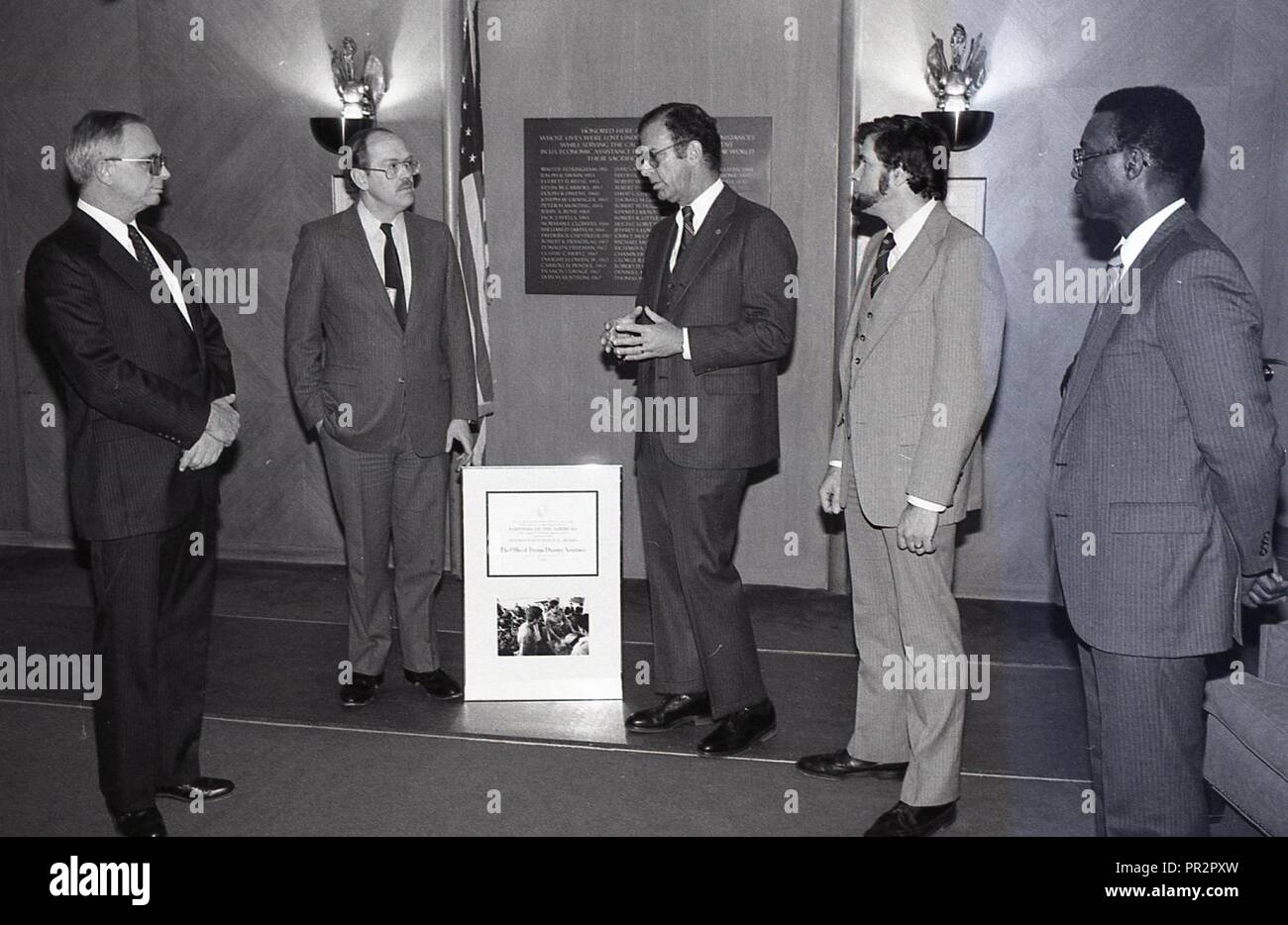 FIVE MEN ARE STANDING AND HAVING A CONVERSATION Stock Photo - Alamy
