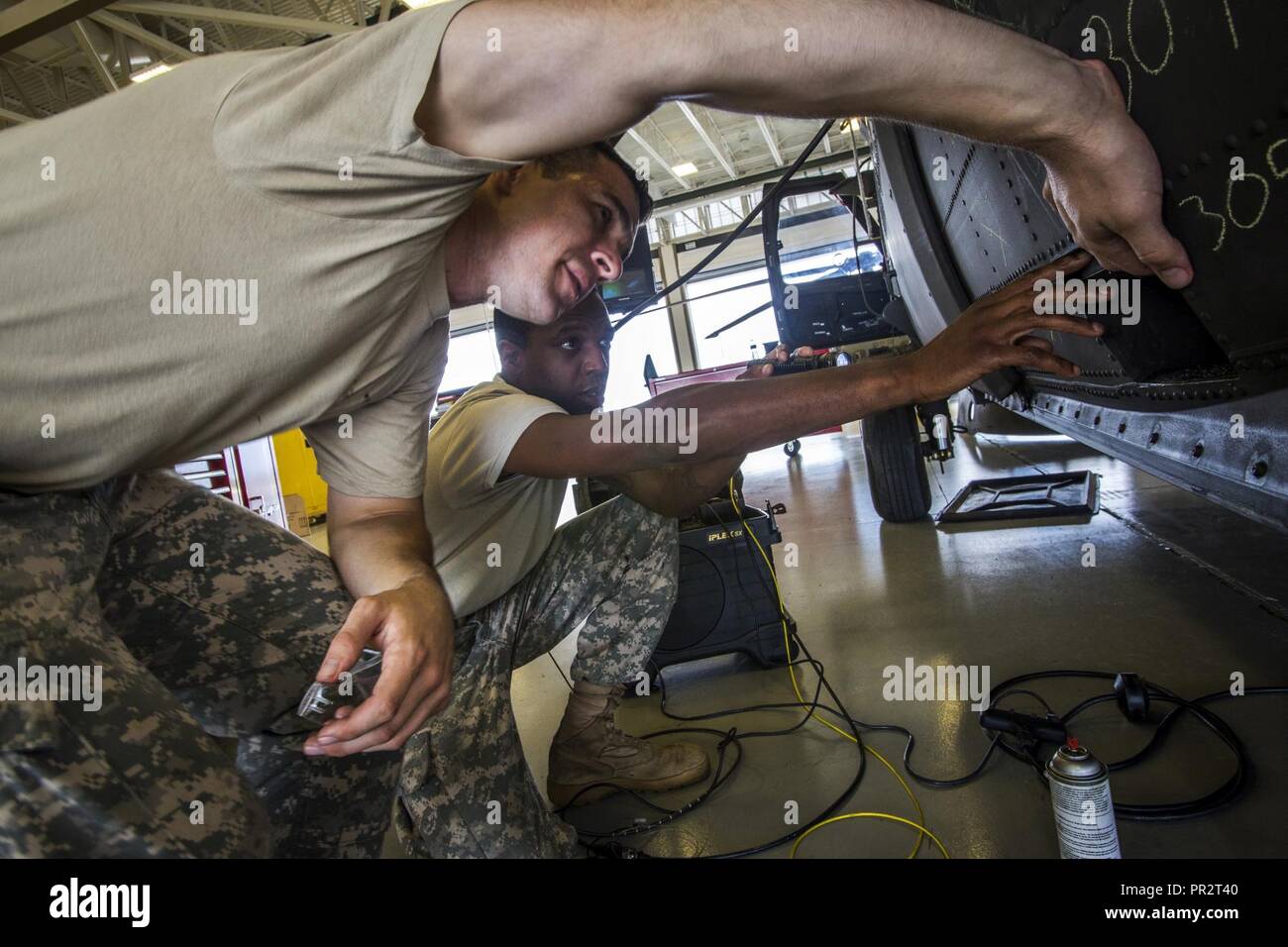 U.S. Army Spc. Colton J. Cloonan, left, and Sgt. Jibreel A. Robinson ...