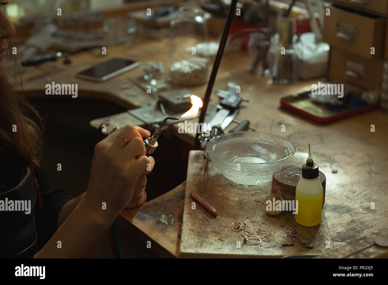 Hand holding torch hi-res stock photography and images - Alamy