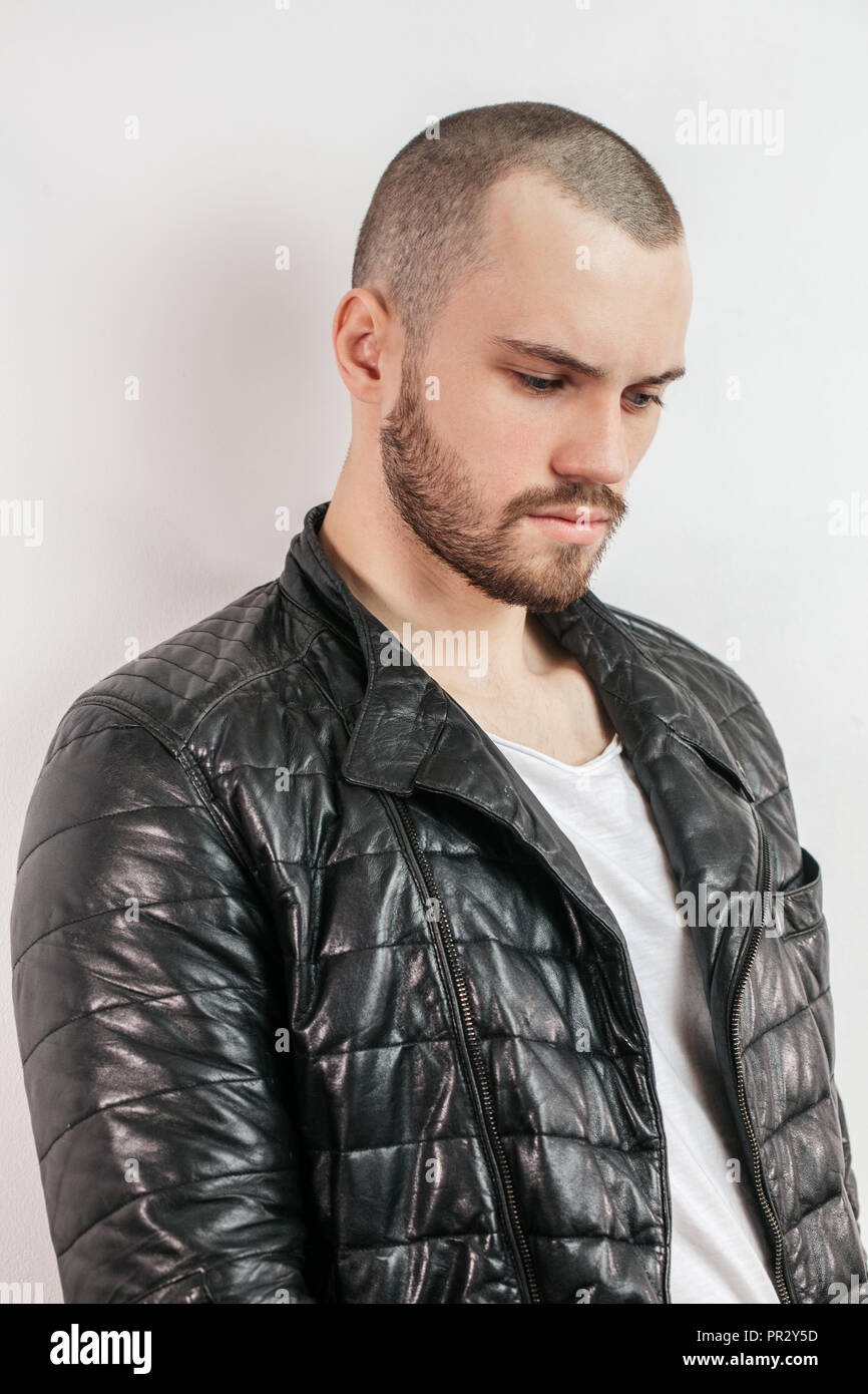 close up side view photo of an unhappy strong man looking down Stock ...