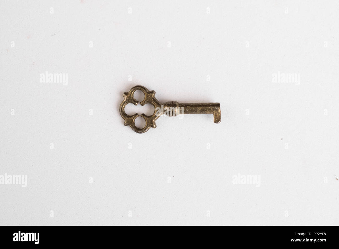 small retro key isolated on white background Stock Photo - Alamy