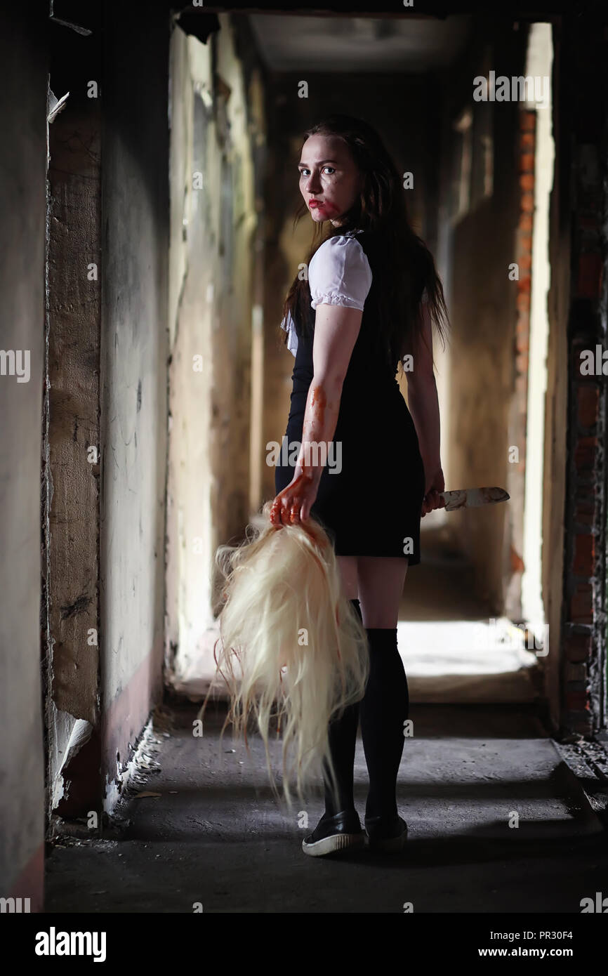 Beautiful red hair bloody girl zombie hi-res stock photography and ...