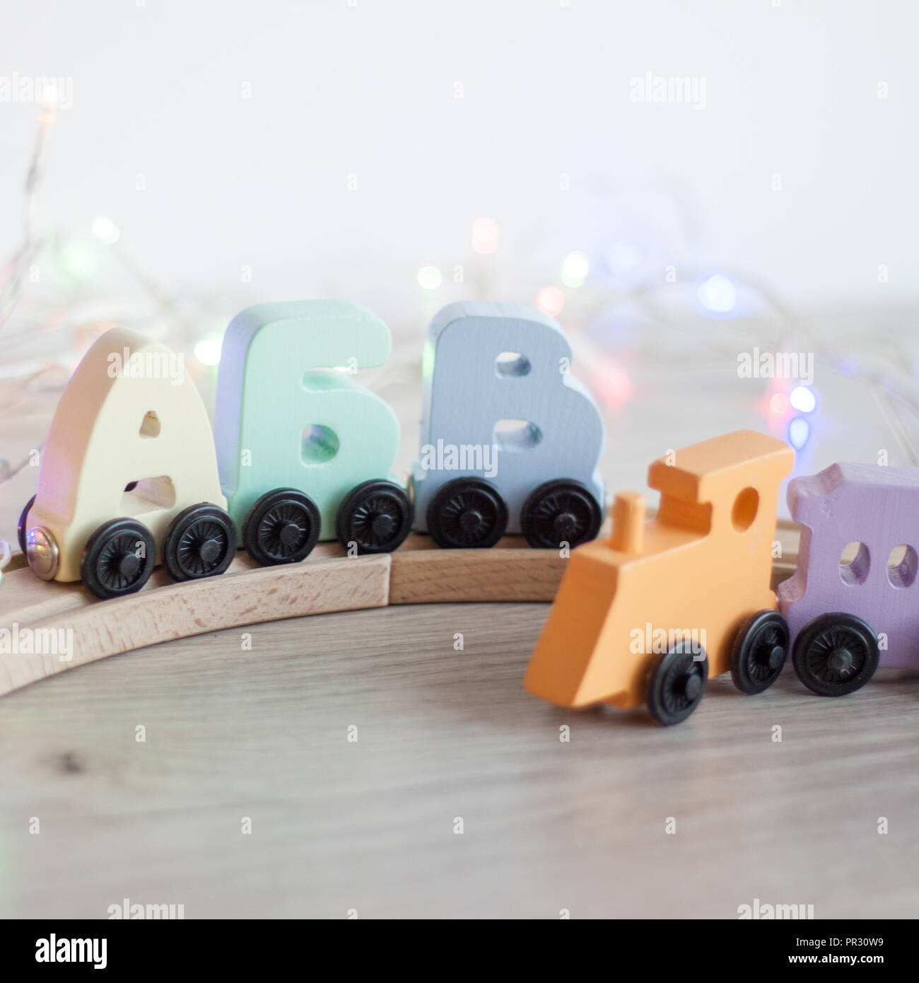Russian wooden letters train alphabet with locomotive on wood railway ...