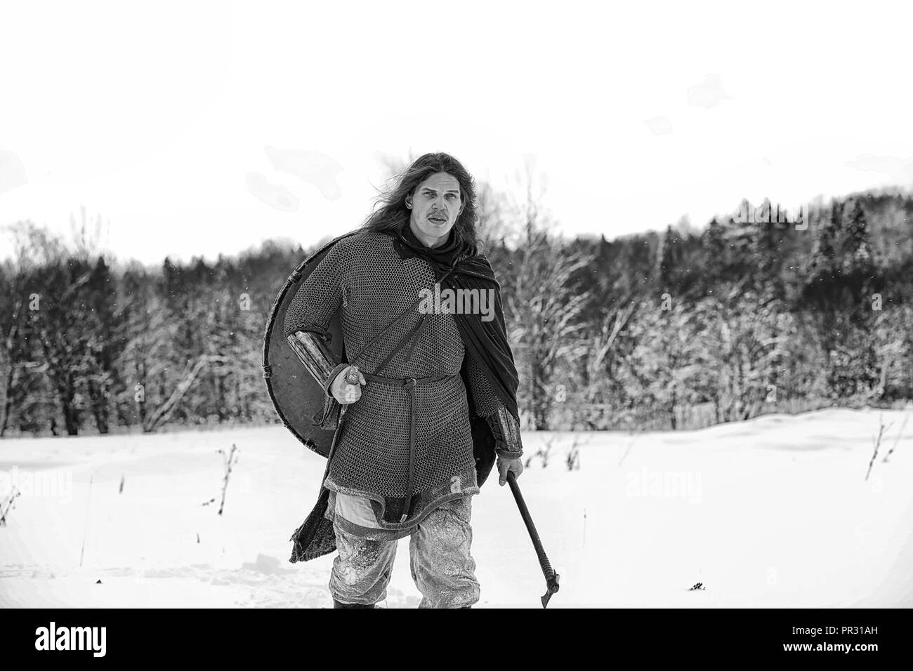 Defender the young warrior in armor Stock Photo - Alamy