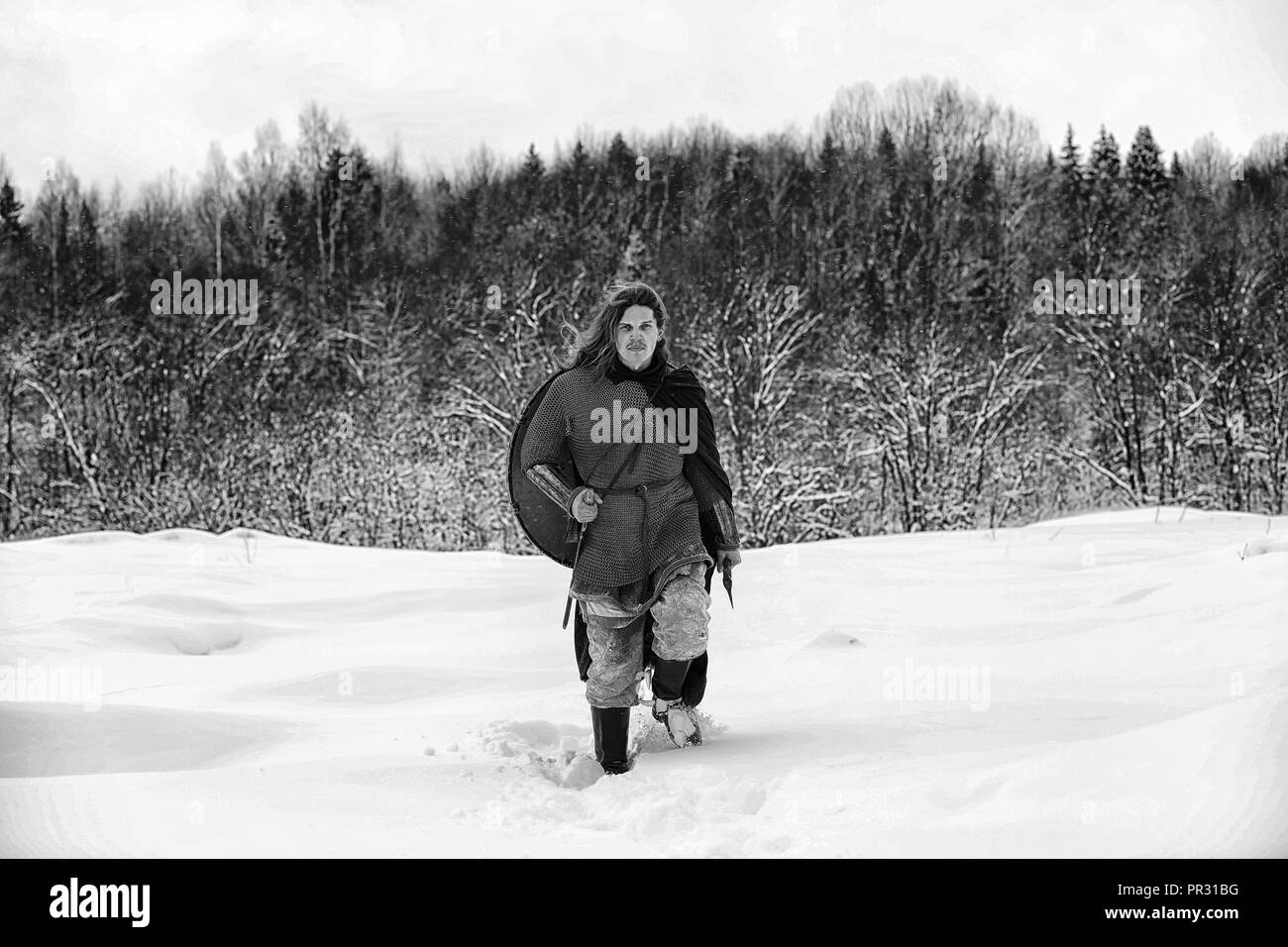 Defender the young warrior in armor Stock Photo - Alamy
