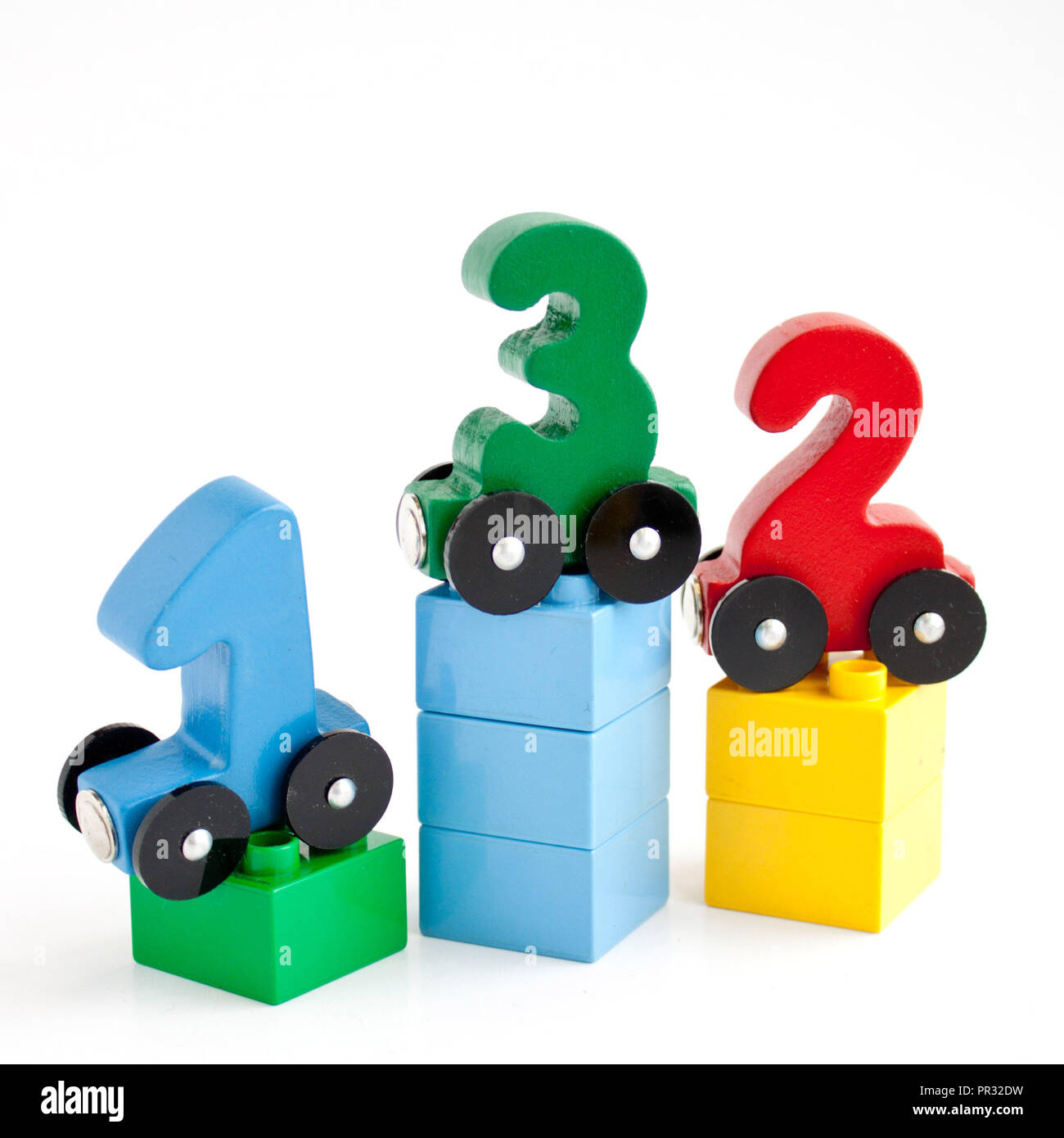 wooden numbers 0,1,2 letters train alphabet . Bright colors of red ...